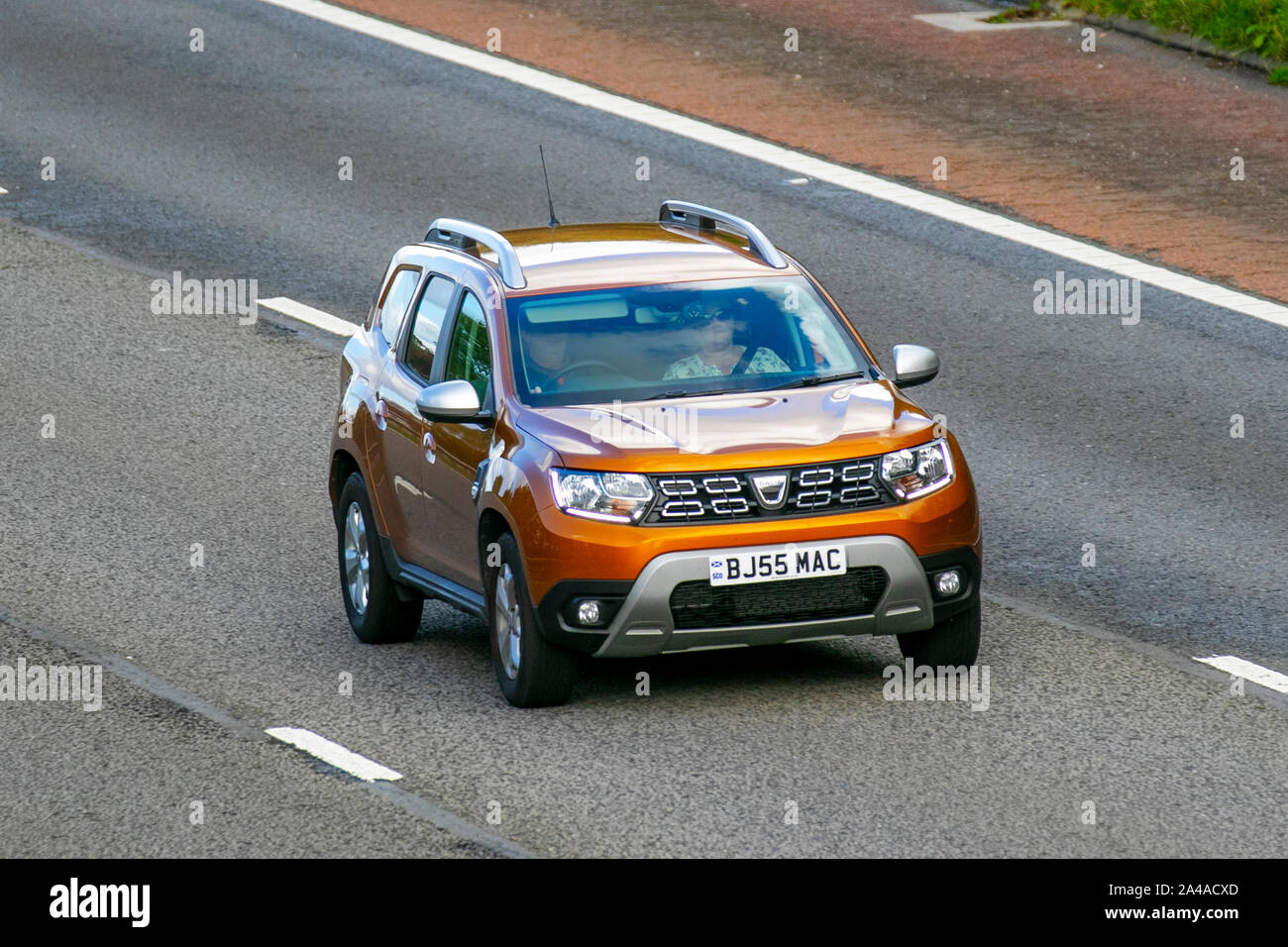 2019 orange Dacia Duster Comfort Blue DCI 4; UK Vehicular traffic ...