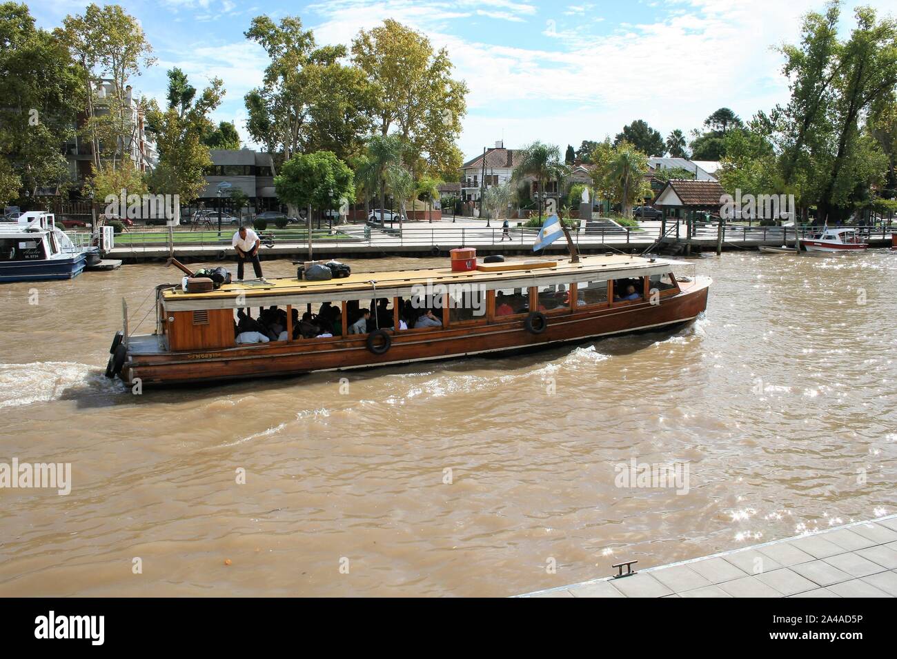Tourism boat on the Tigre river. Barge carrying tourists around the ...