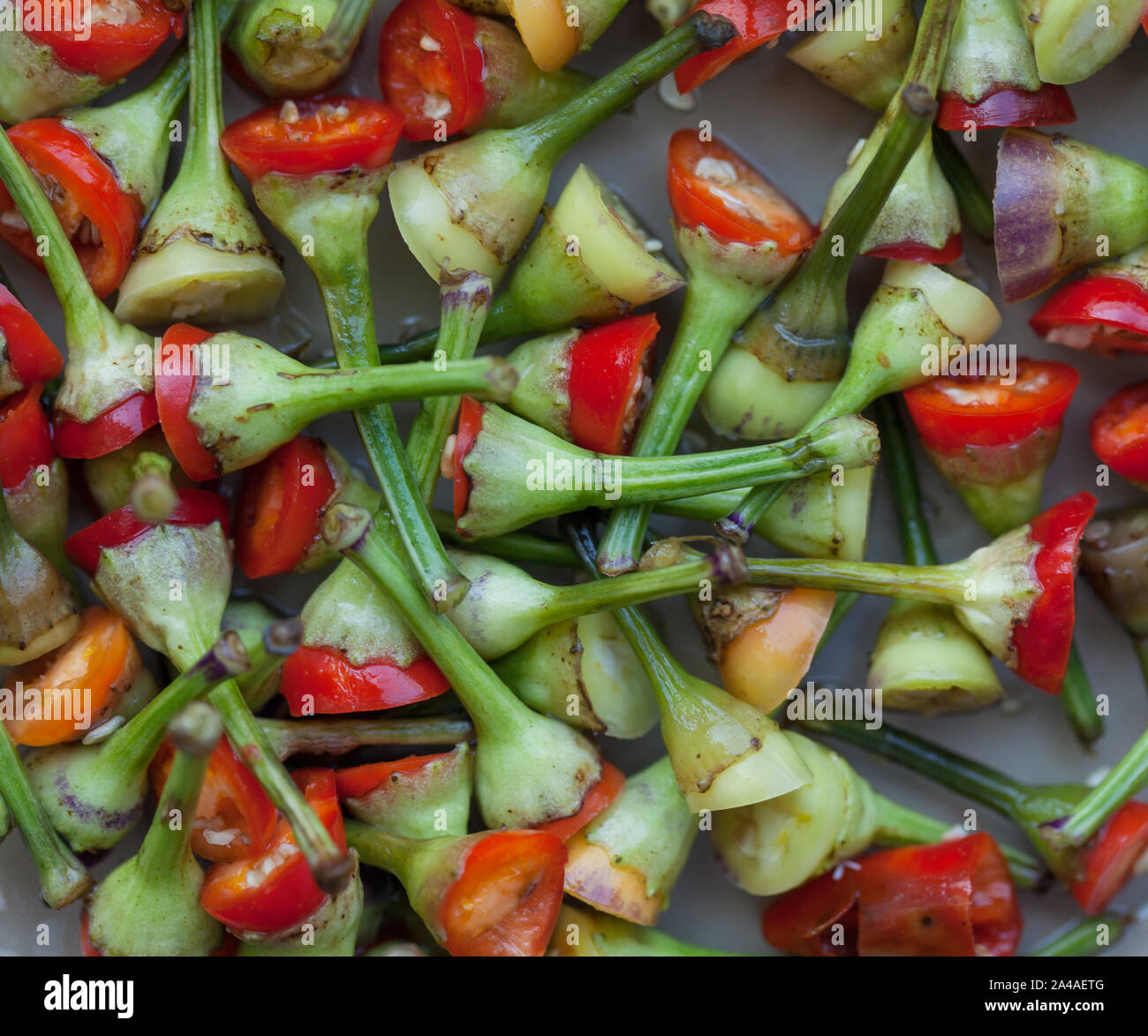 Tails of red and yellow peppers hi-res stock photography and images - Alamy