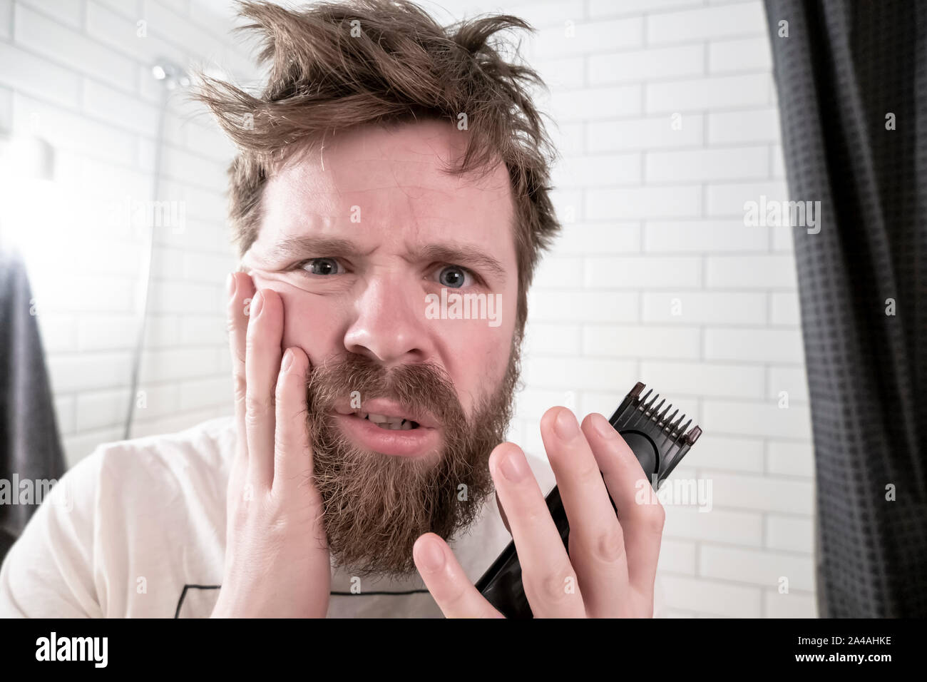 Man with long unkempt hair hi-res stock photography and images - Alamy