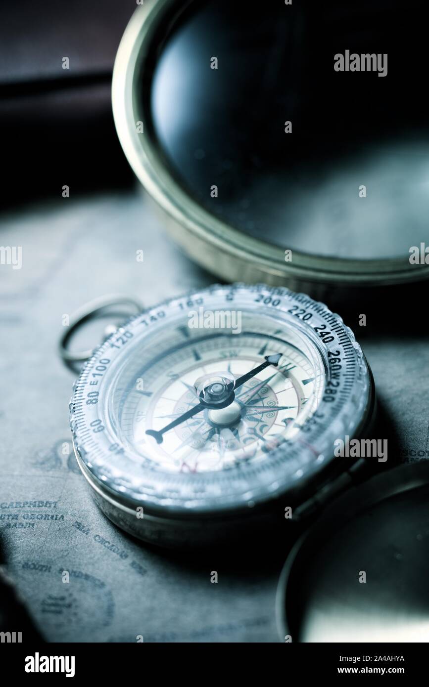 Vintage compass and old navigation map Stock Photo - Alamy