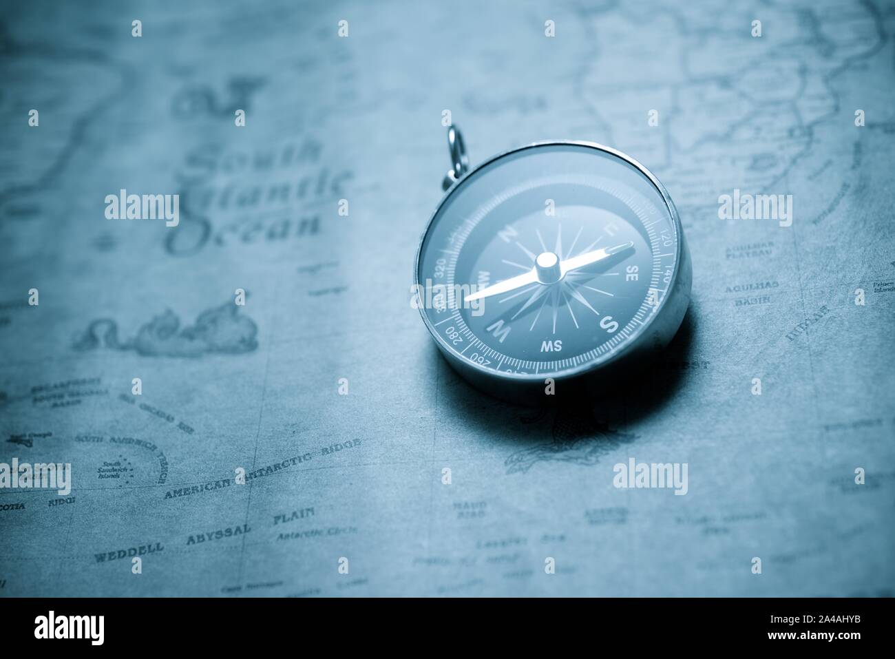 Vintage compass and old navigation map Stock Photo - Alamy