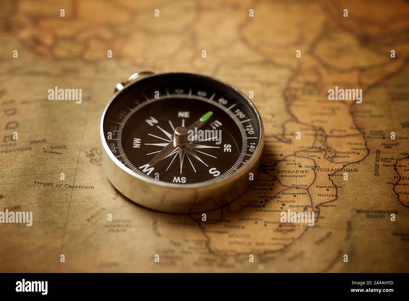 Vintage compass and old navigation map Stock Photo - Alamy
