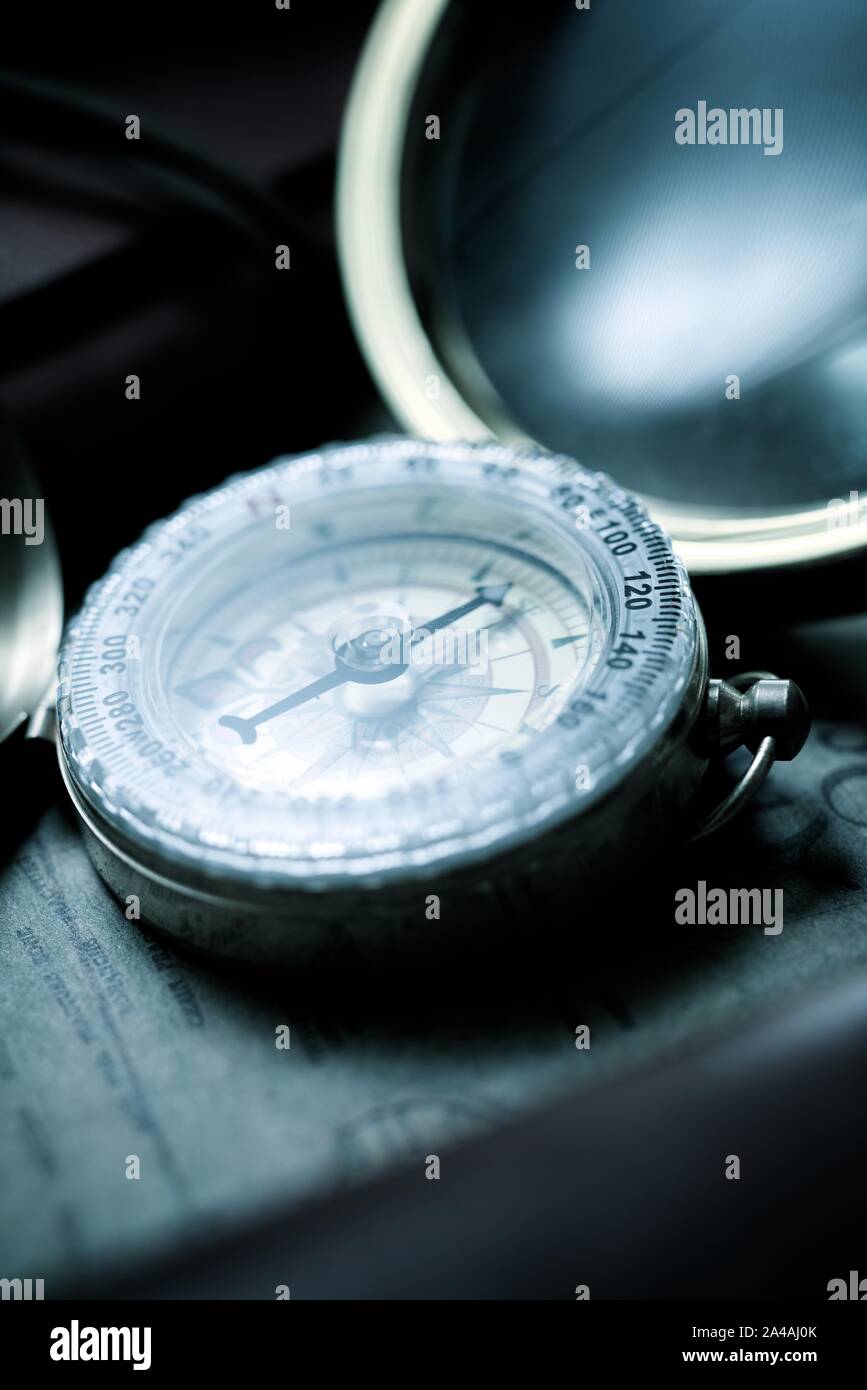 Vintage compass and old navigation map Stock Photo - Alamy