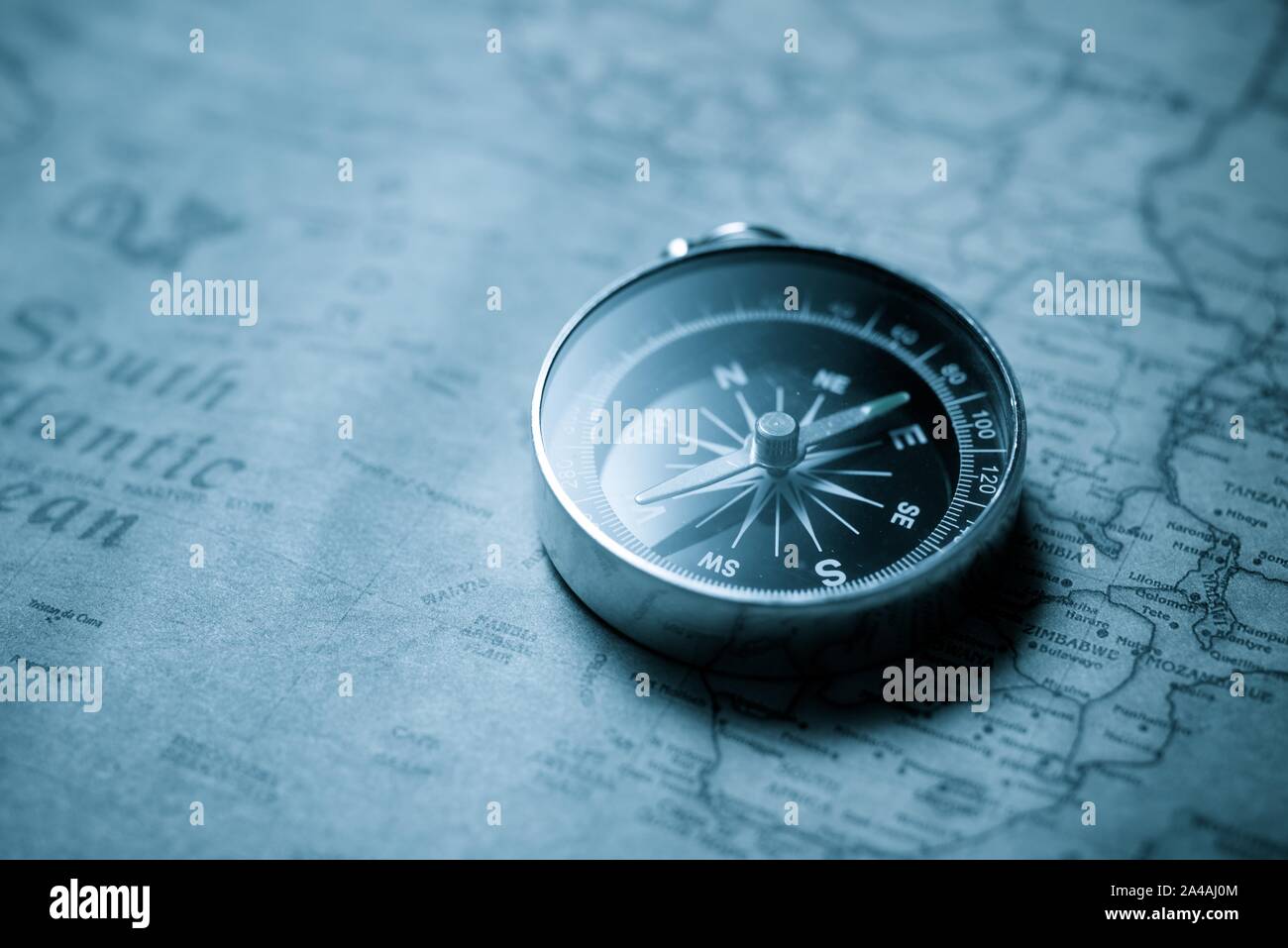 Vintage compass and old navigation map Stock Photo - Alamy