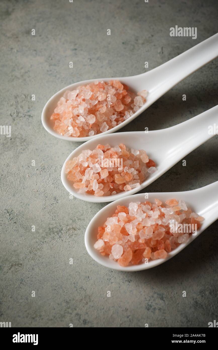 Himalayan salt on a little spoons Stock Photo - Alamy
