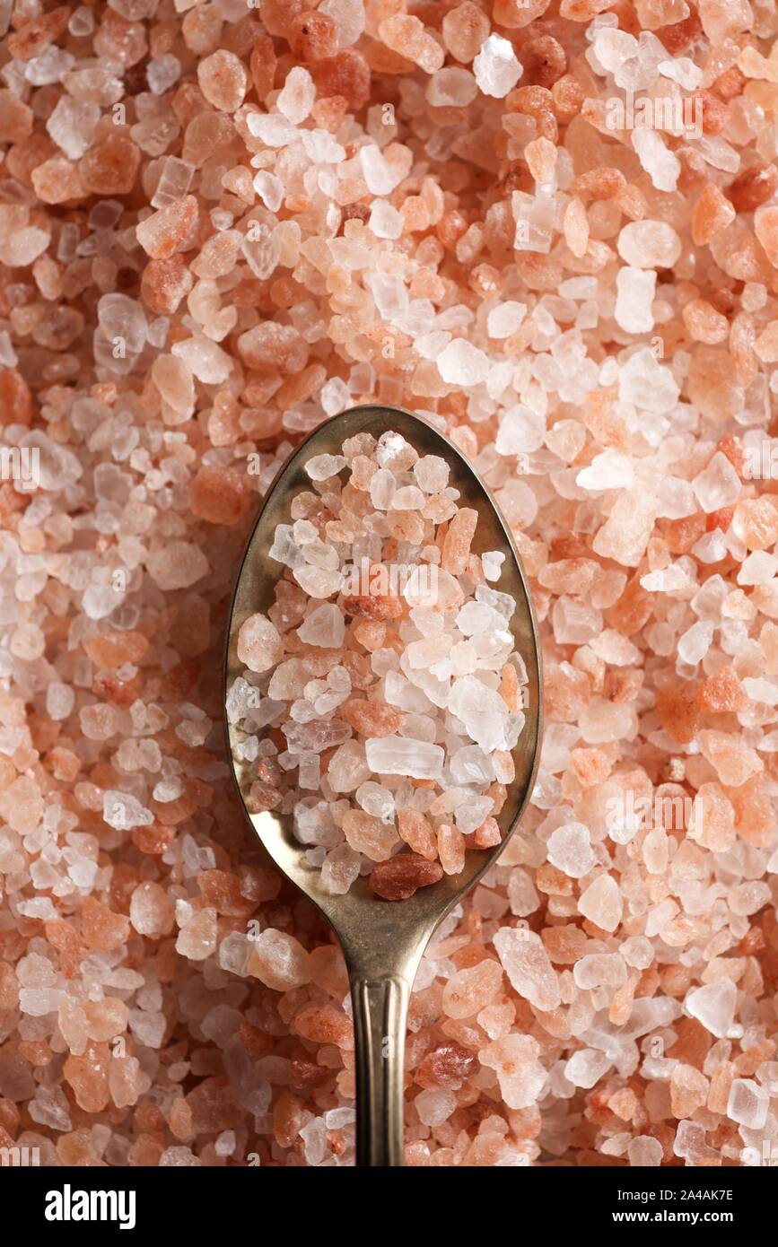 Himalayan salt on a spoon Stock Photo - Alamy