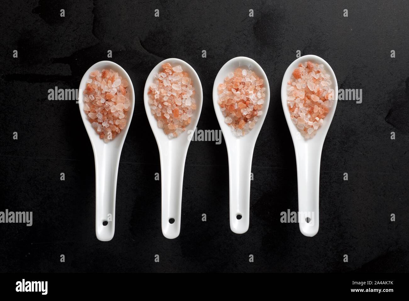 Four salt spoons hi-res stock photography and images - Alamy