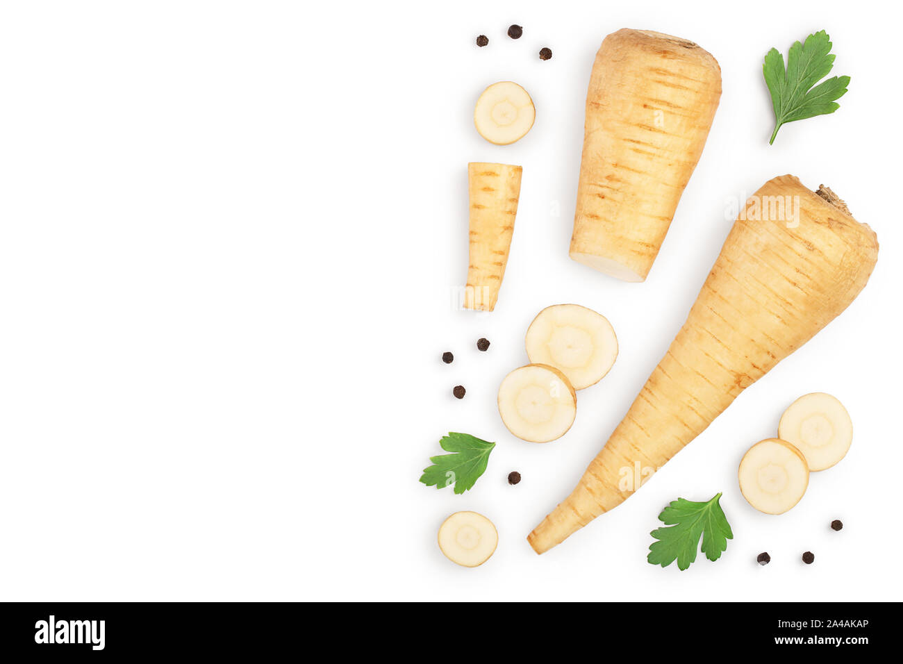 Parsnip root and slices with parsley peppercorns isolated on white ...
