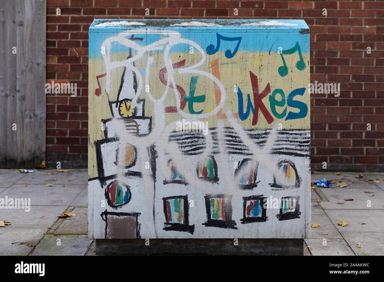 A telephone cable junction painted in artwork on a city street in ...