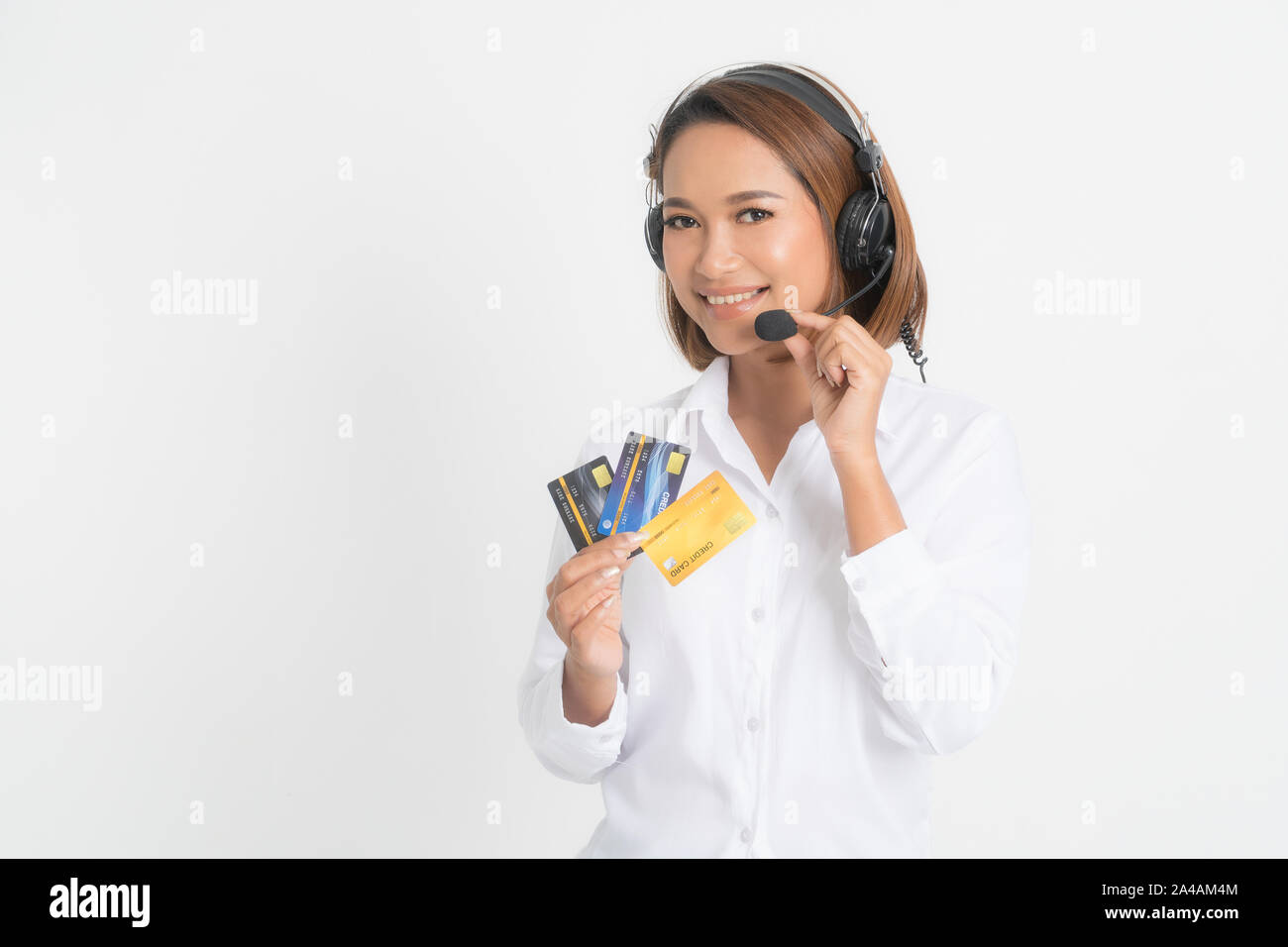 Friendly female helpline operator or call center showing blank credit ...