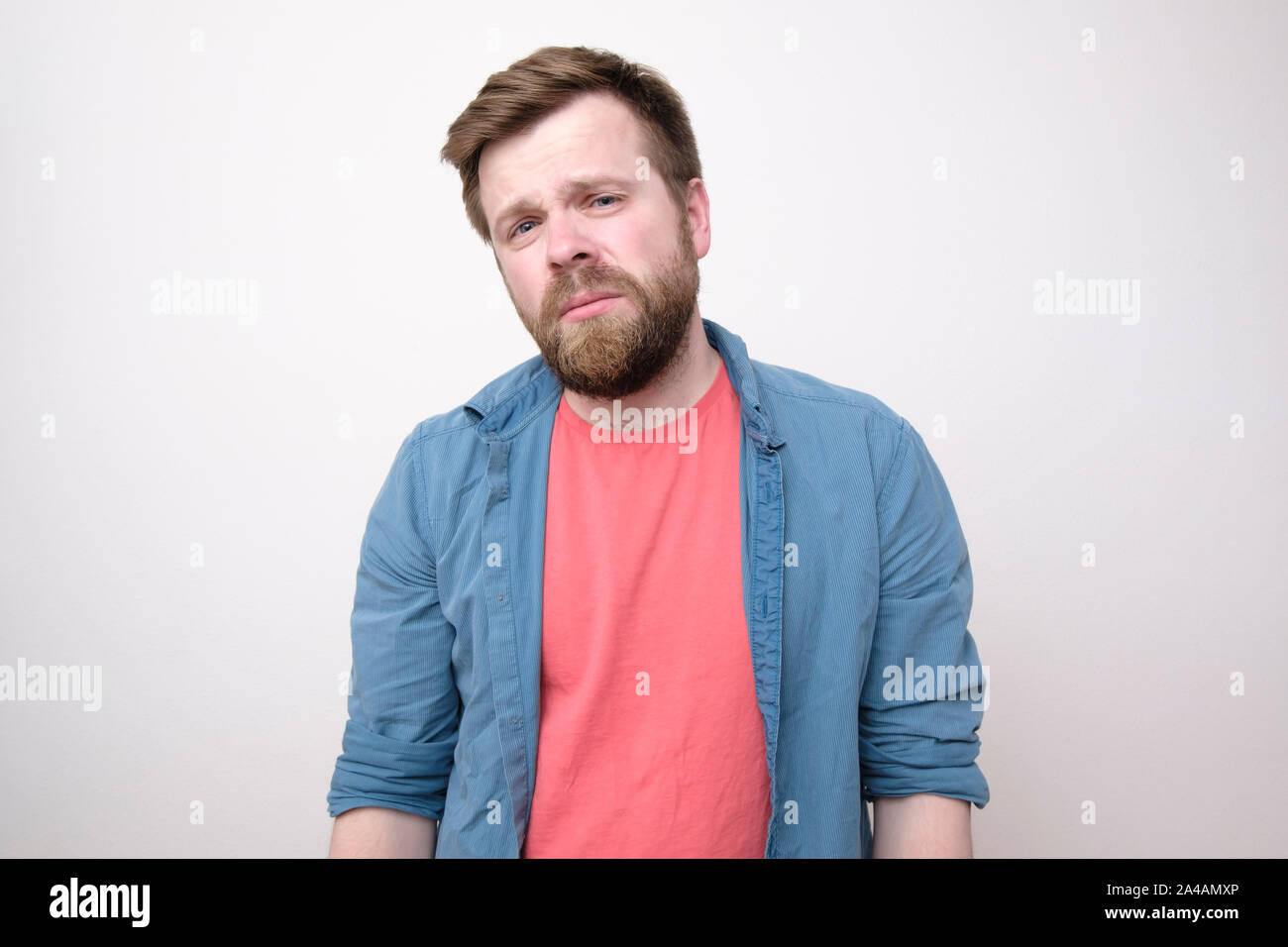 Weary bearded young man hi-res stock photography and images - Alamy