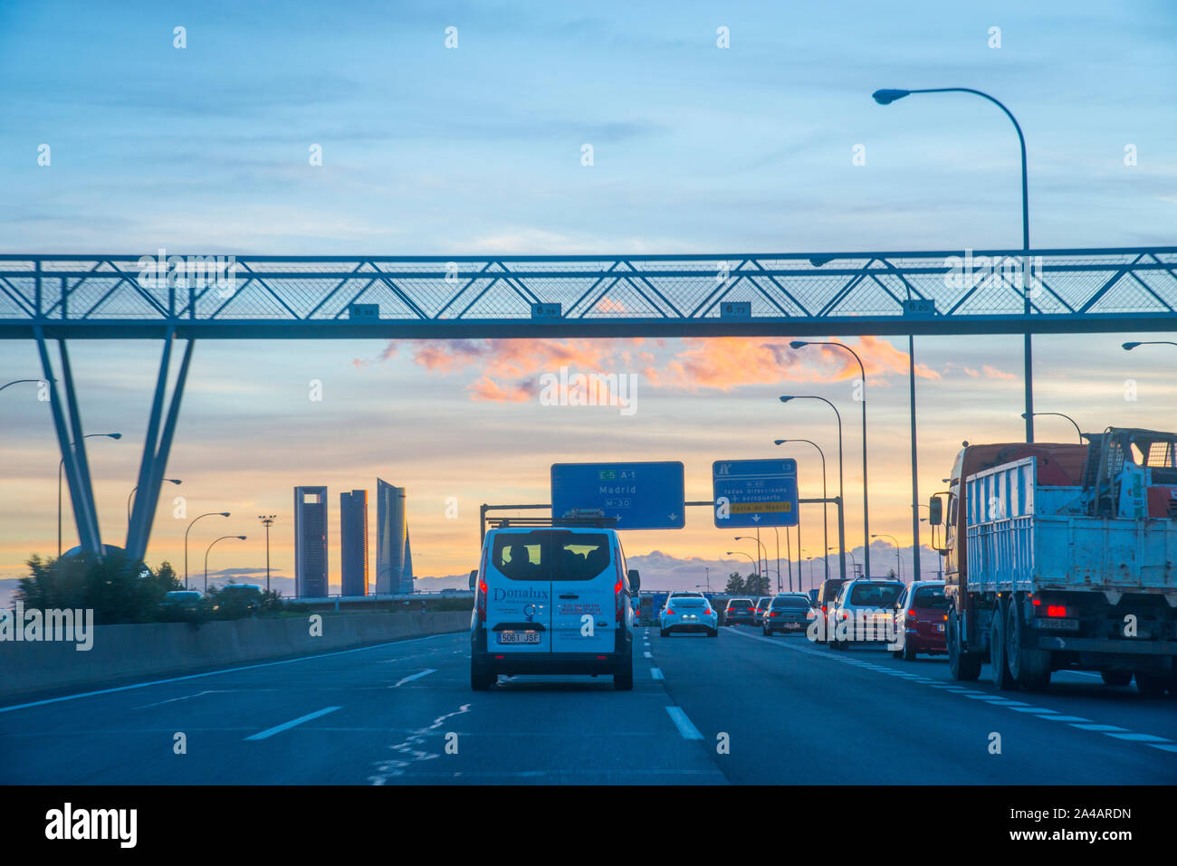 Rush hour in freeway at dusk. Madrid, Spain Stock Photo - Alamy