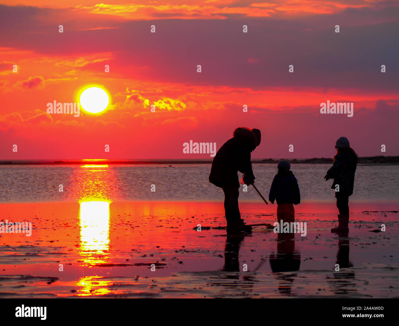Happy family beach north sea hi-res stock photography and images - Alamy