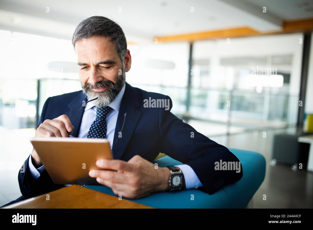Using devices hi-res stock photography and images - Alamy