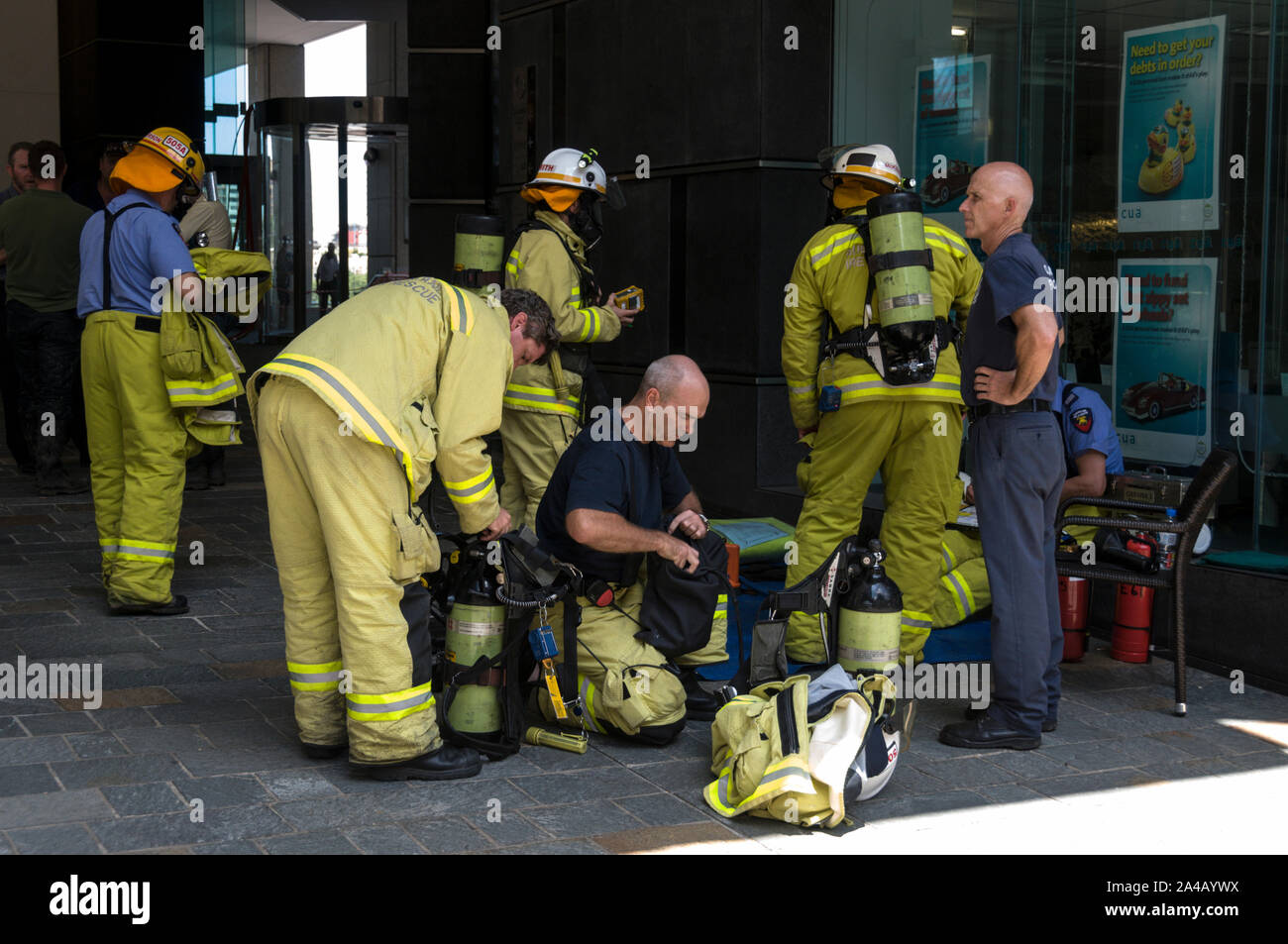 Members of the Queensland fire and rescue service attending an office ...