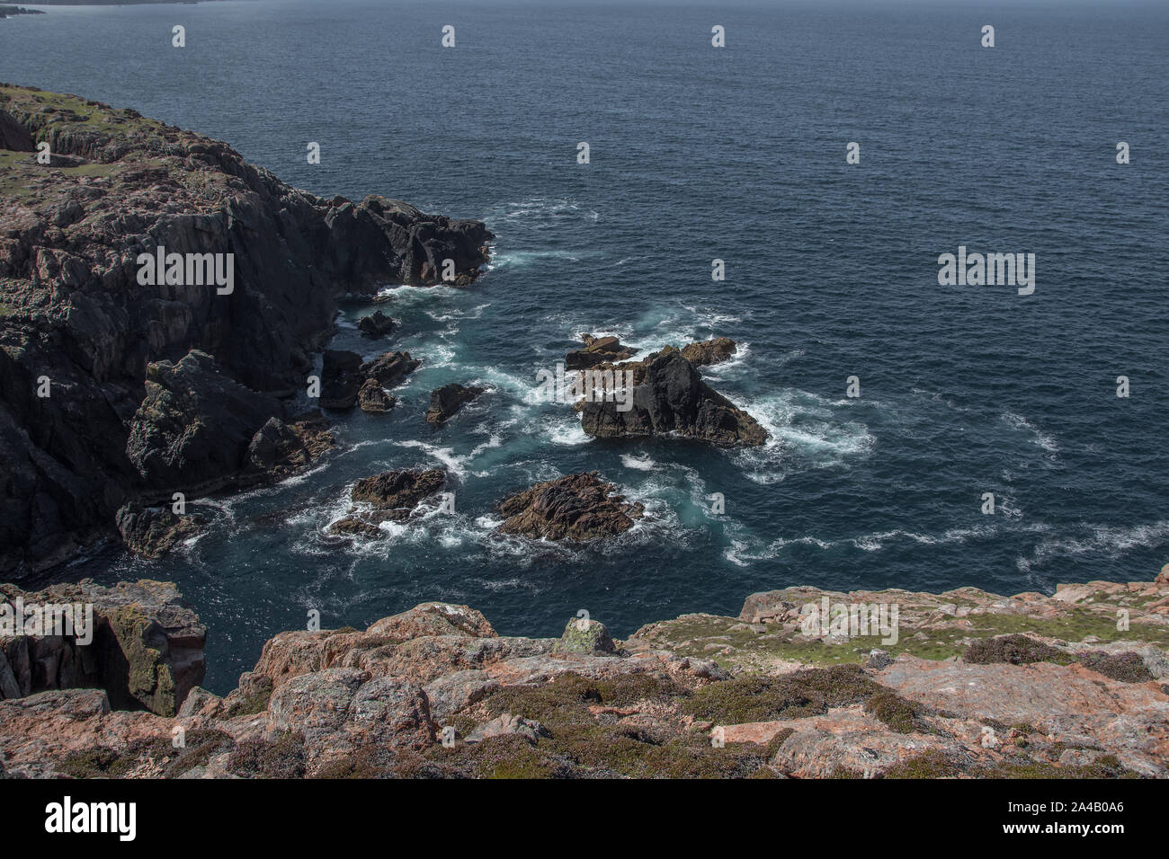 Coastal scenery around the south west shore of Muckle Roe showing the ...