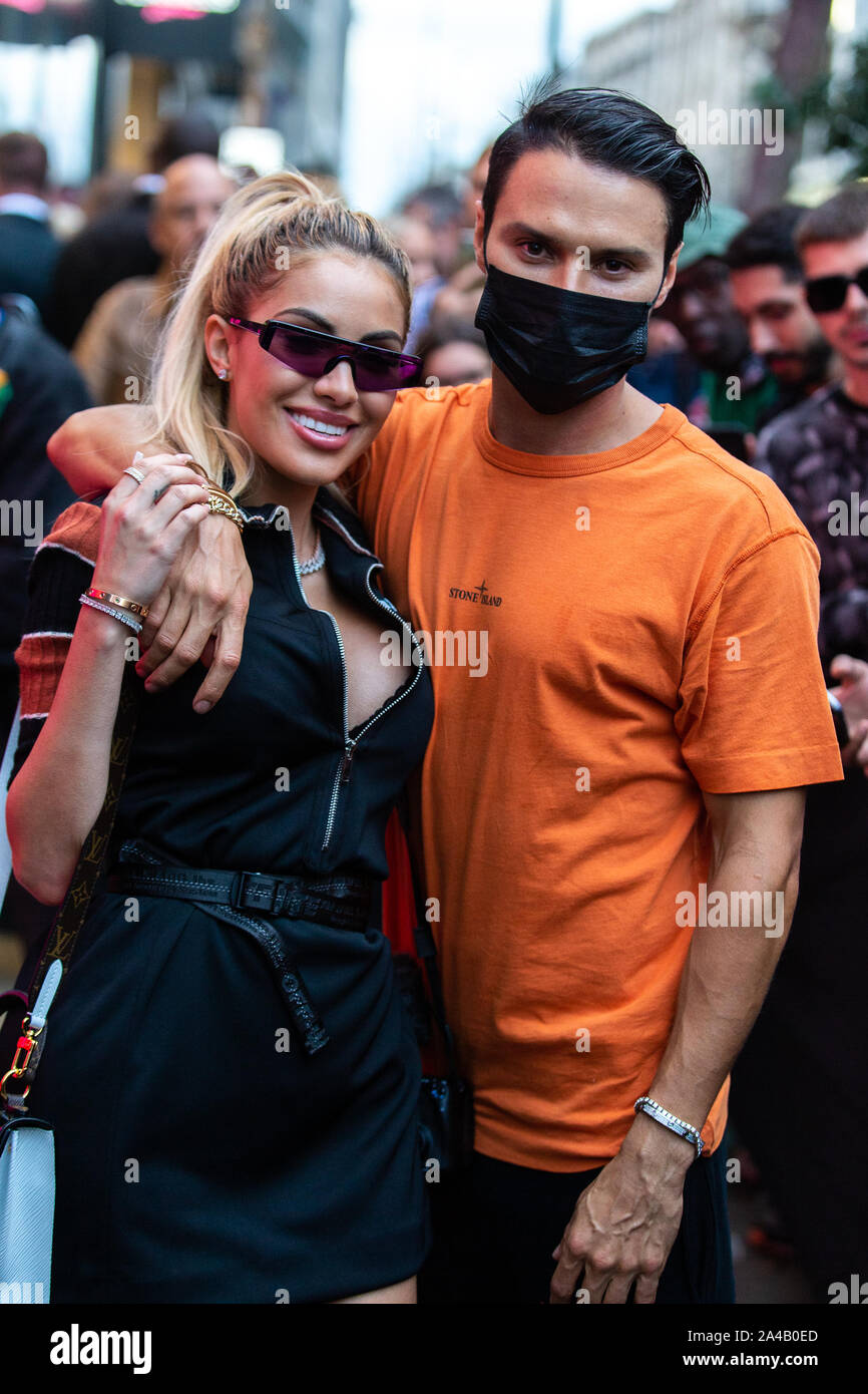 Street artist Alec Monopoly abseils down the Flannels store on Oxford ...