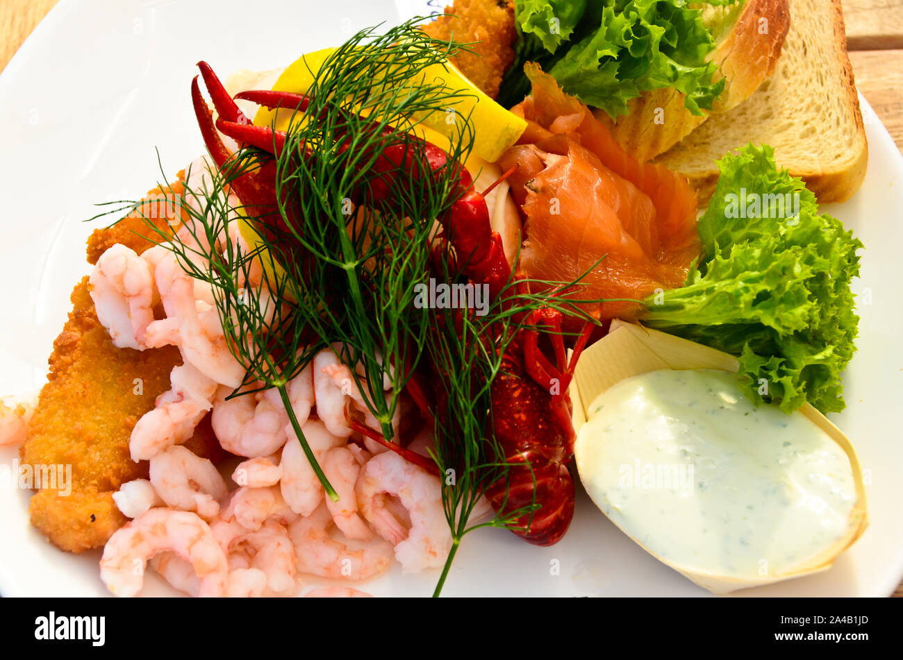 A very delicious plate of several seafood Stock Photo - Alamy