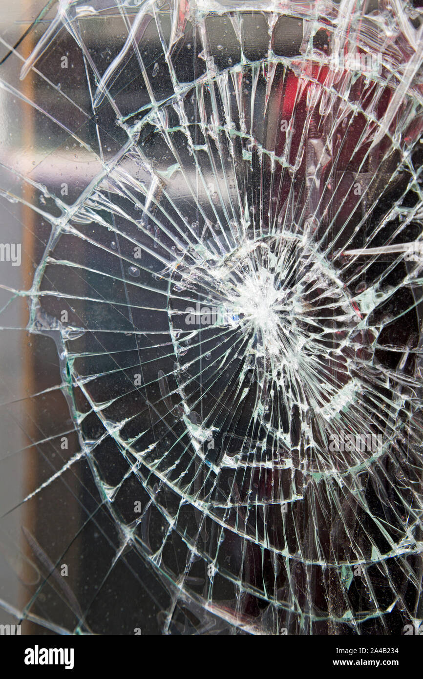 Shattered glass shot close up in portrait format Stock Photo - Alamy