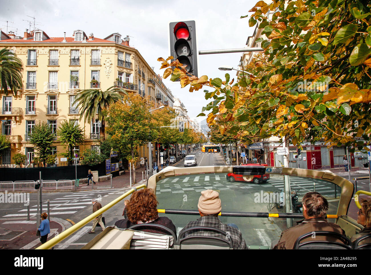 Autumn in the city Nice on the French Riviera. Tourists on tour bus ...