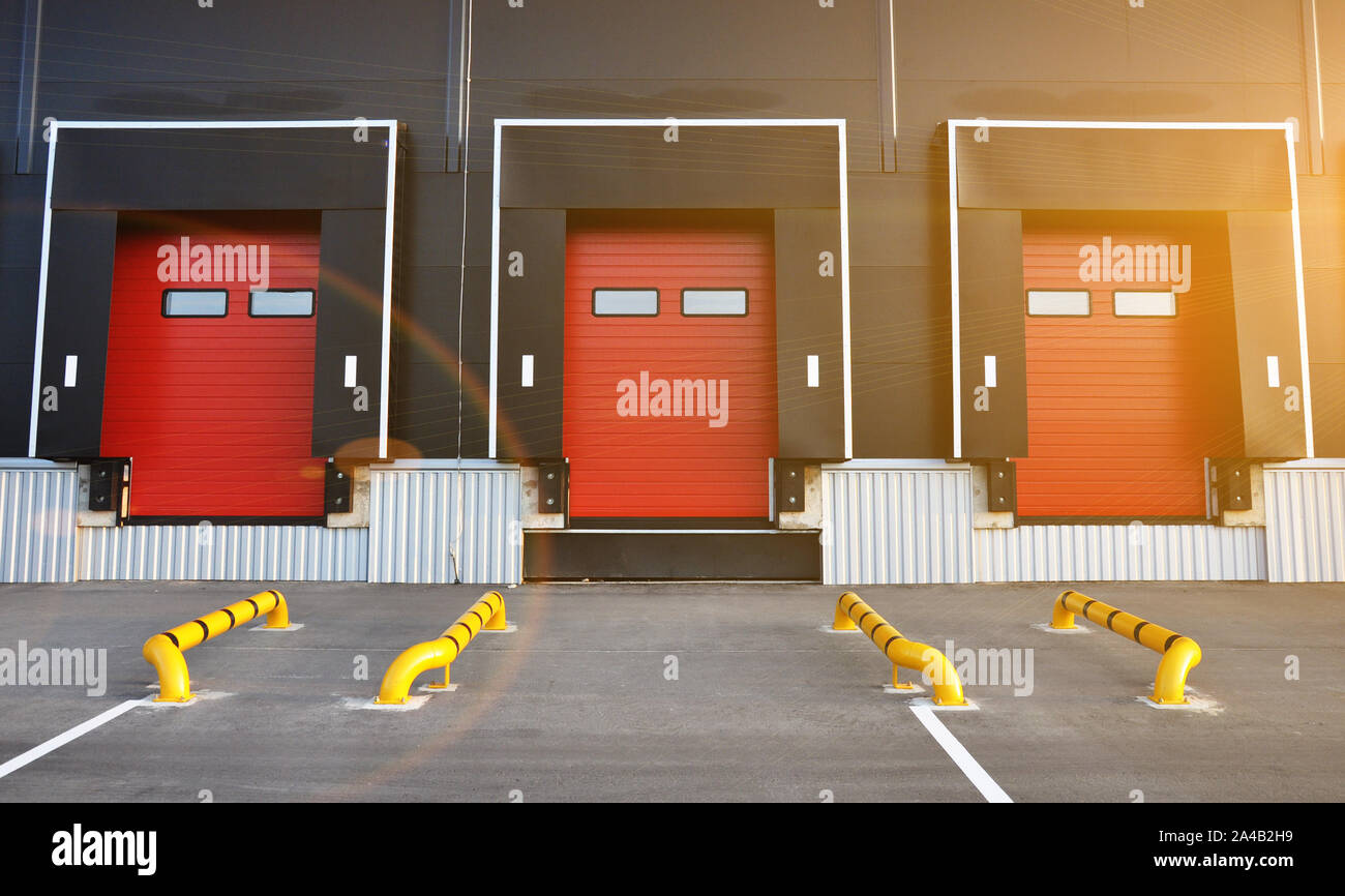 A Large distribution warehouse with gates for loading goods Stock Photo ...