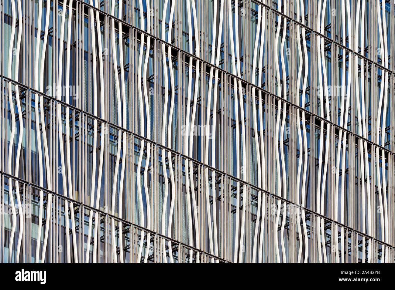 Closeup View Of Curved Louvers Cover Facade Of Building And It Creates ...
