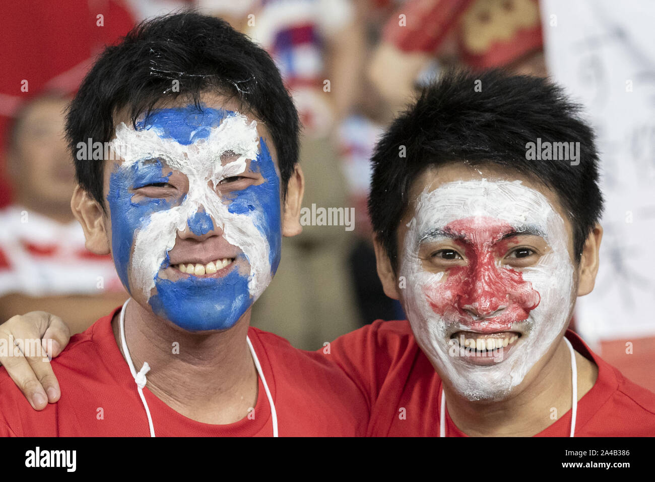 Kanagawa, Japan. 13th Oct, 2019. Japanese fans with face paint on their ...