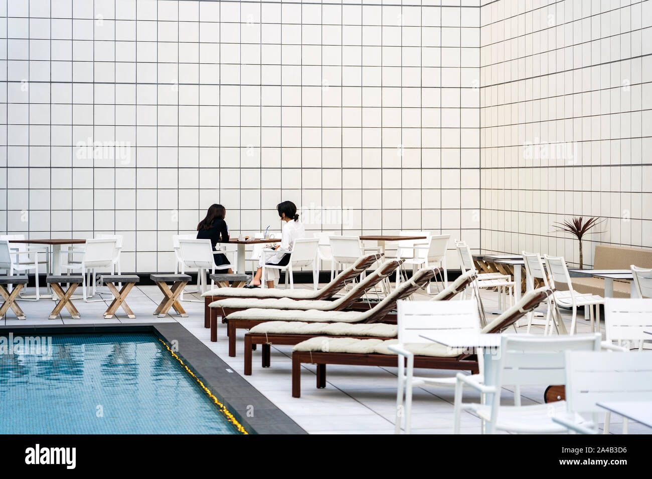 Two girls swimming hi-res stock photography and images - Alamy
