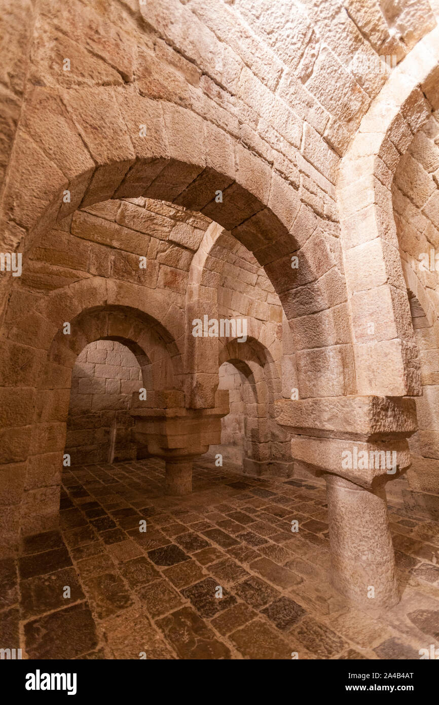 Arches and capital in Crypt, 11th century, of Monastery of Leyre ...