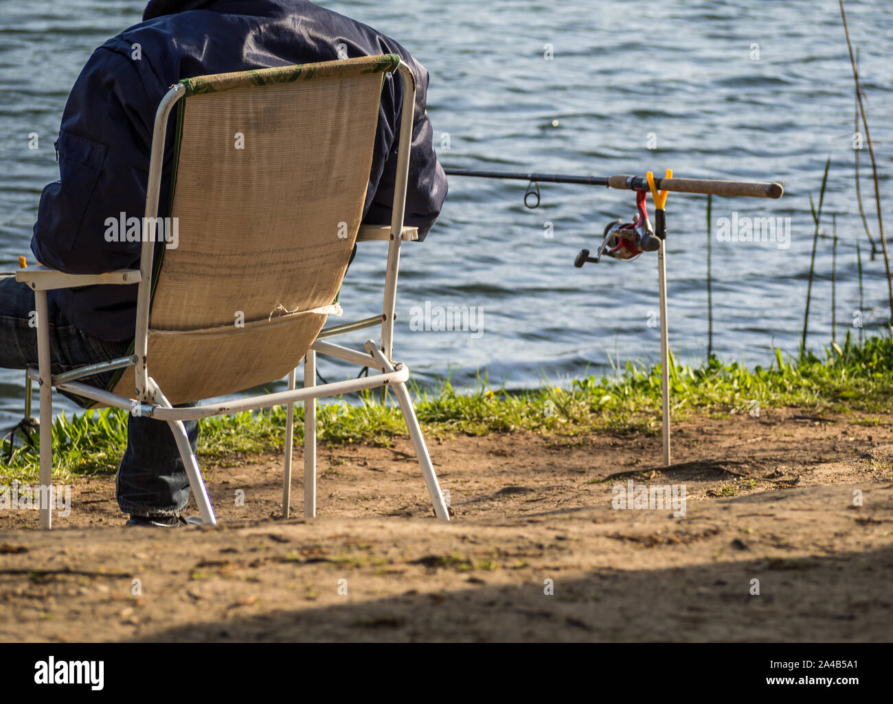 Man catching fish hi-res stock photography and images - Alamy