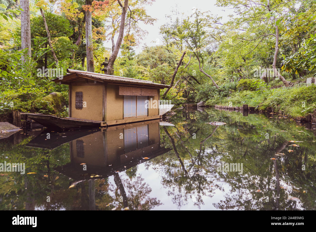 Reflection of the Oriental Houseboat in the Pond. The Japanese House ...