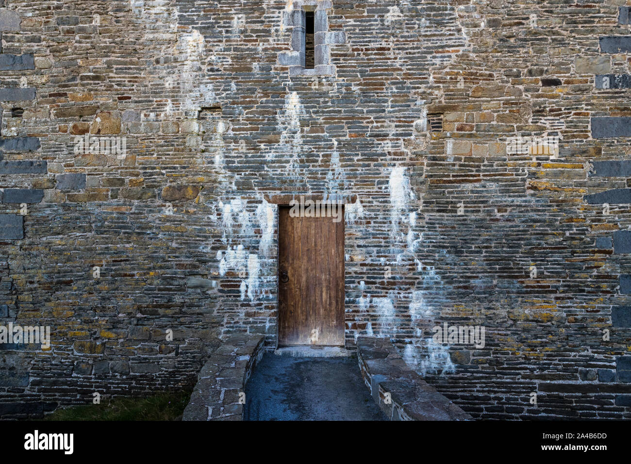 Close up on closed and locked wooden door of medieval Irish castle ...