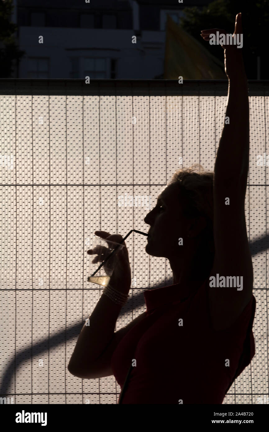 Shadow woman drinking wine hi-res stock photography and images - Alamy