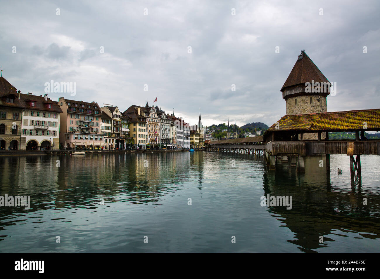 Lucerne bridge and Lake Lucerne. Famous Chapel Bridge in Lucerne ...