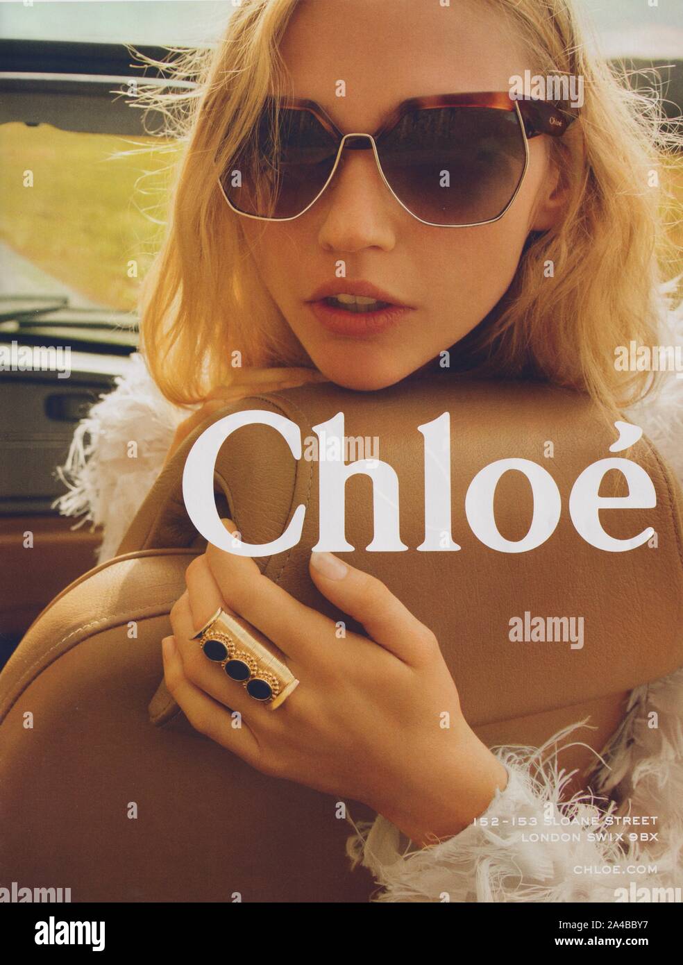poster advertising Chloe fashion house with Sasha Pivovarova in paper ...
