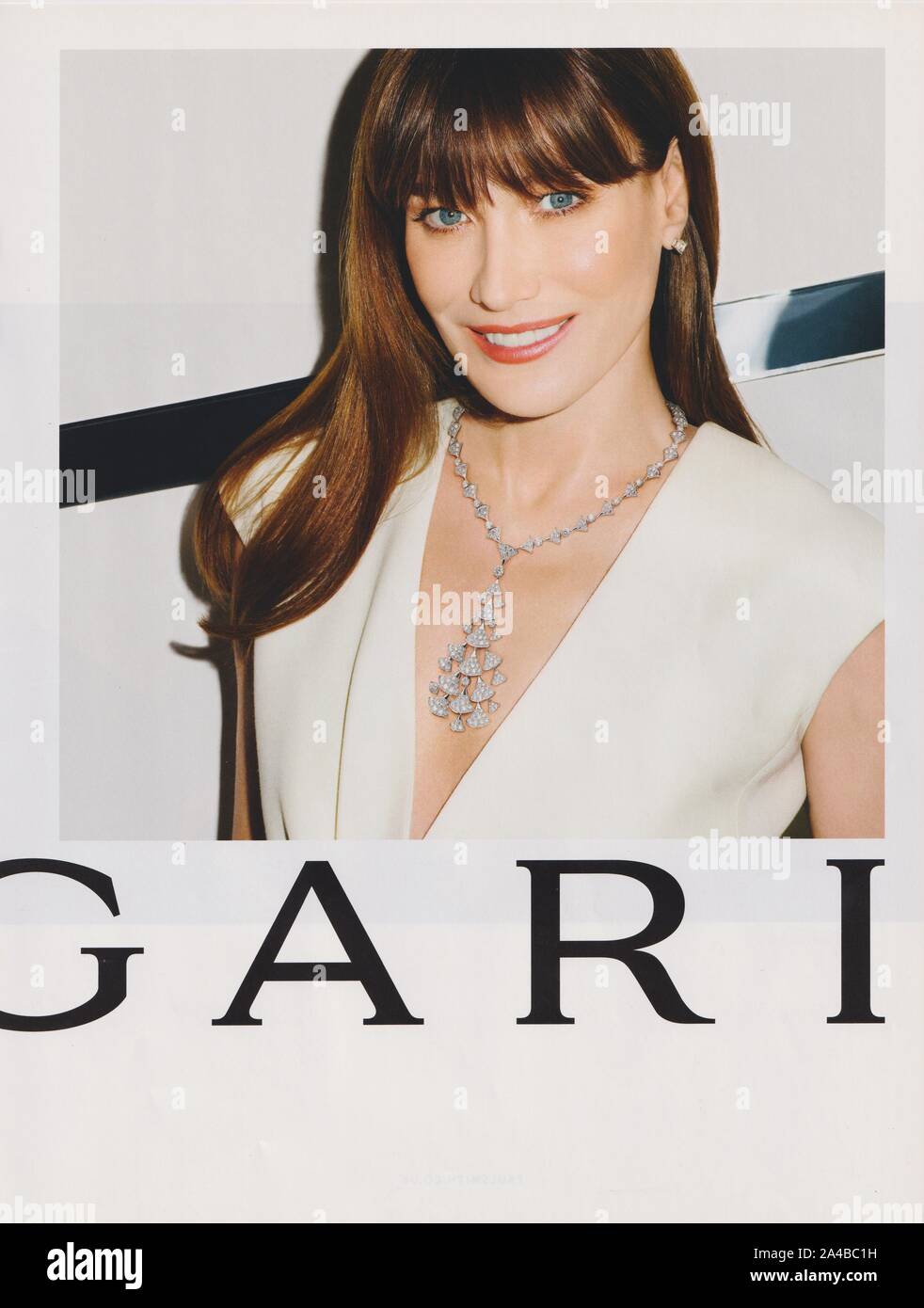 poster advertising BVLGARI Roma fashion house with Carla Bruni in paper ...