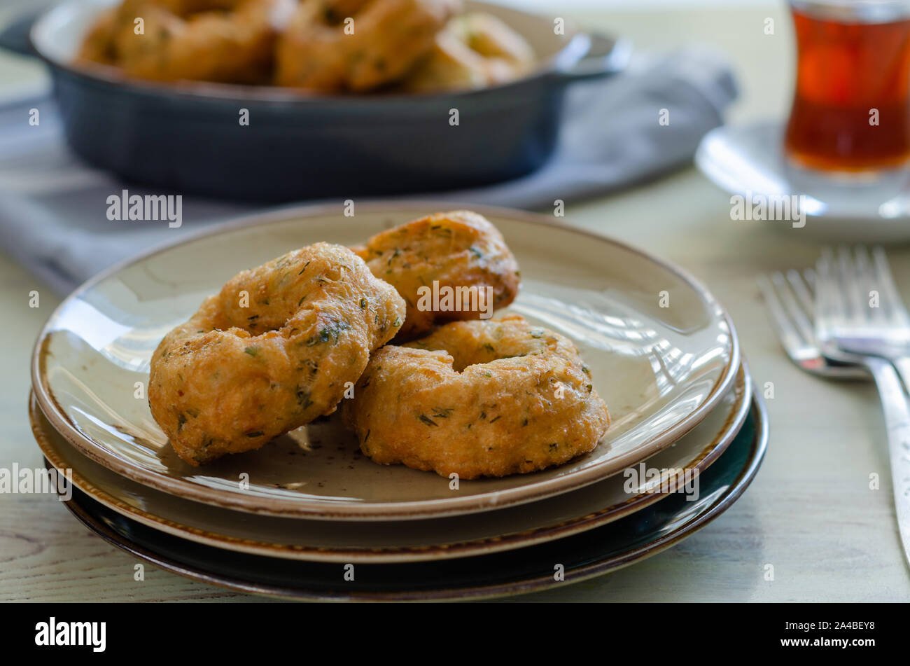 Traditional Turkish pastry : Pişi ; fried dough in oil with dill in ...