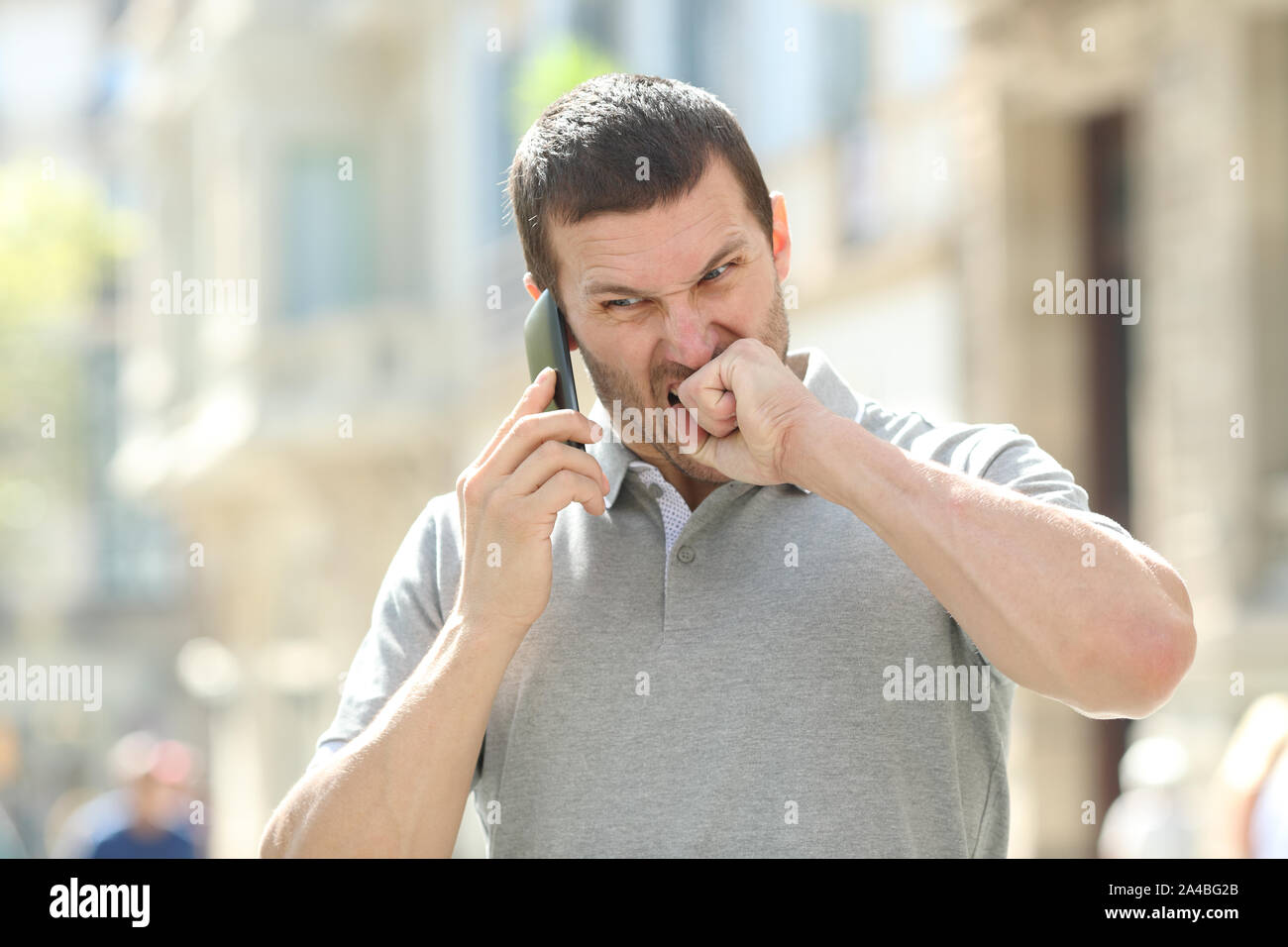 Angry Person On Cell Phone