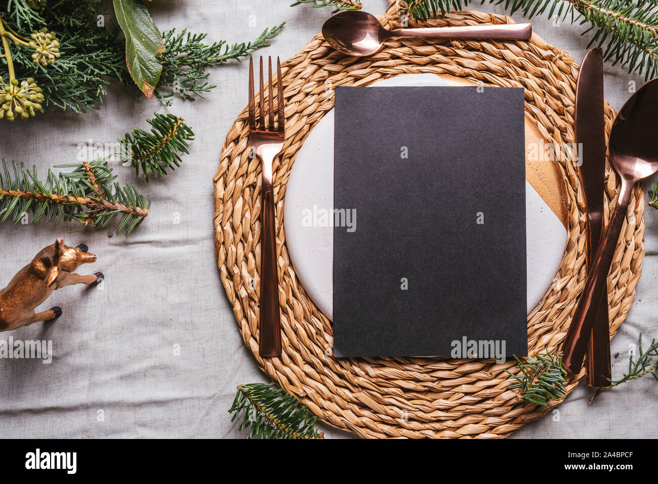 Elegant Christmas or thanksgiving place settings with empty menu on the ...