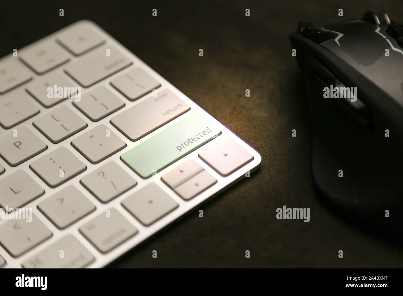 Protected written on keyboard key - data security and protection Stock ...