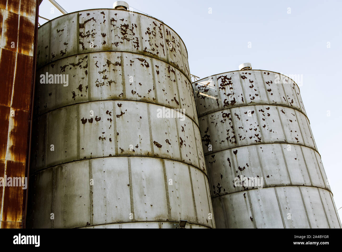 Old steel silo shows signs of use Stock Photo - Alamy