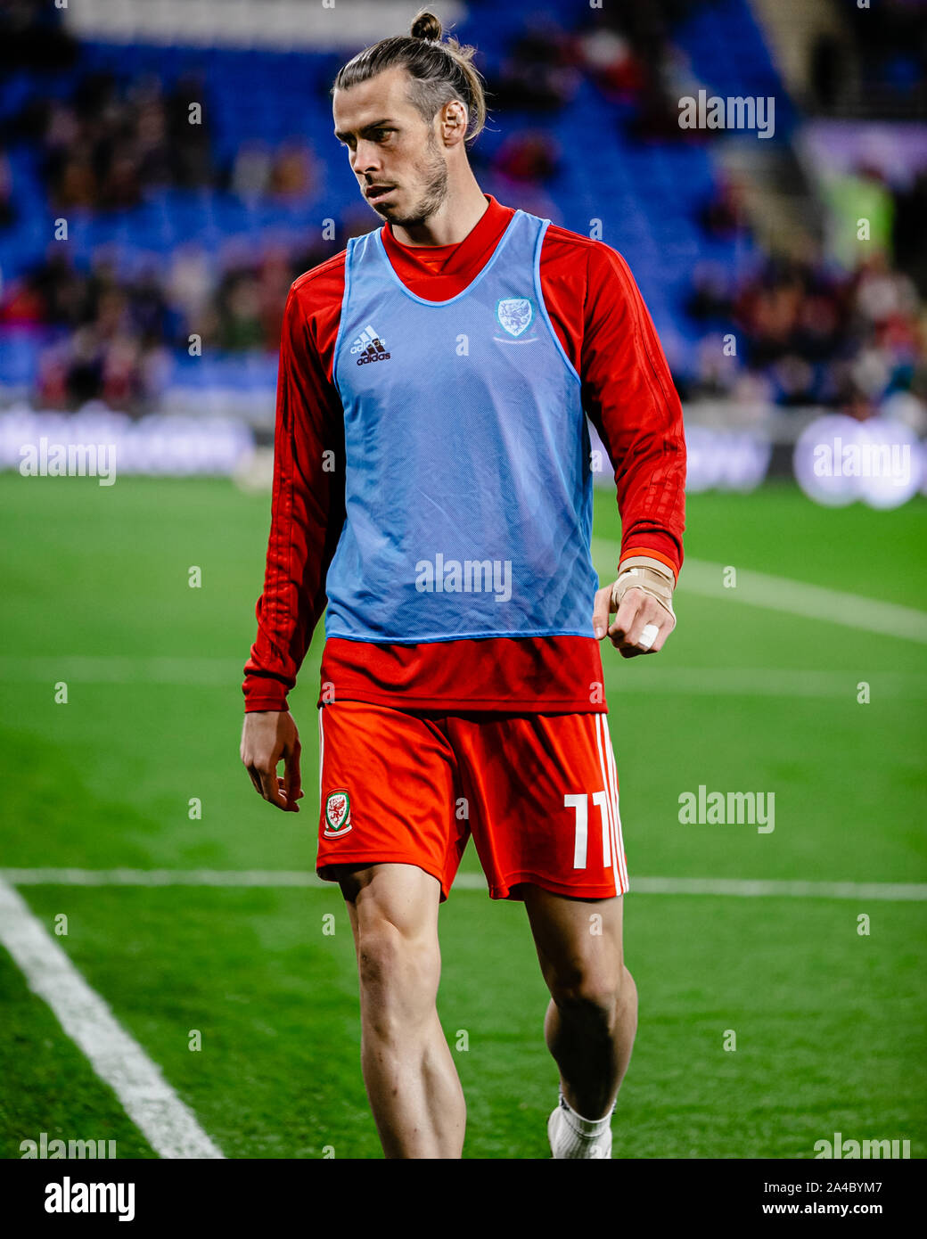 CARDIFF, WALES - OCTOBER 13: Gareth Bale warms up prior to the UEFA ...