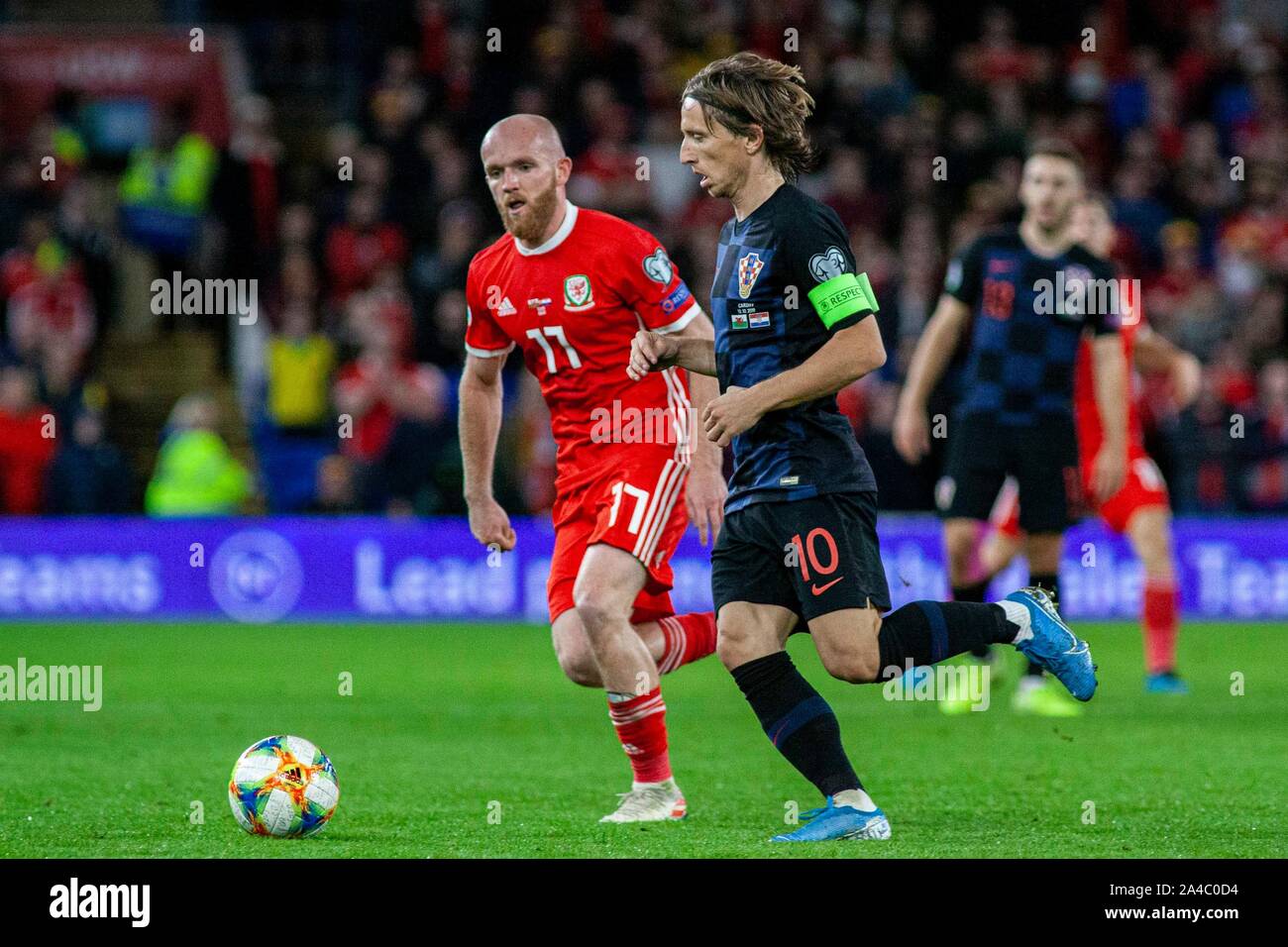 Cardiff, Wales 13/10/19. Luka Modric of Croatia in action against Jonny ...