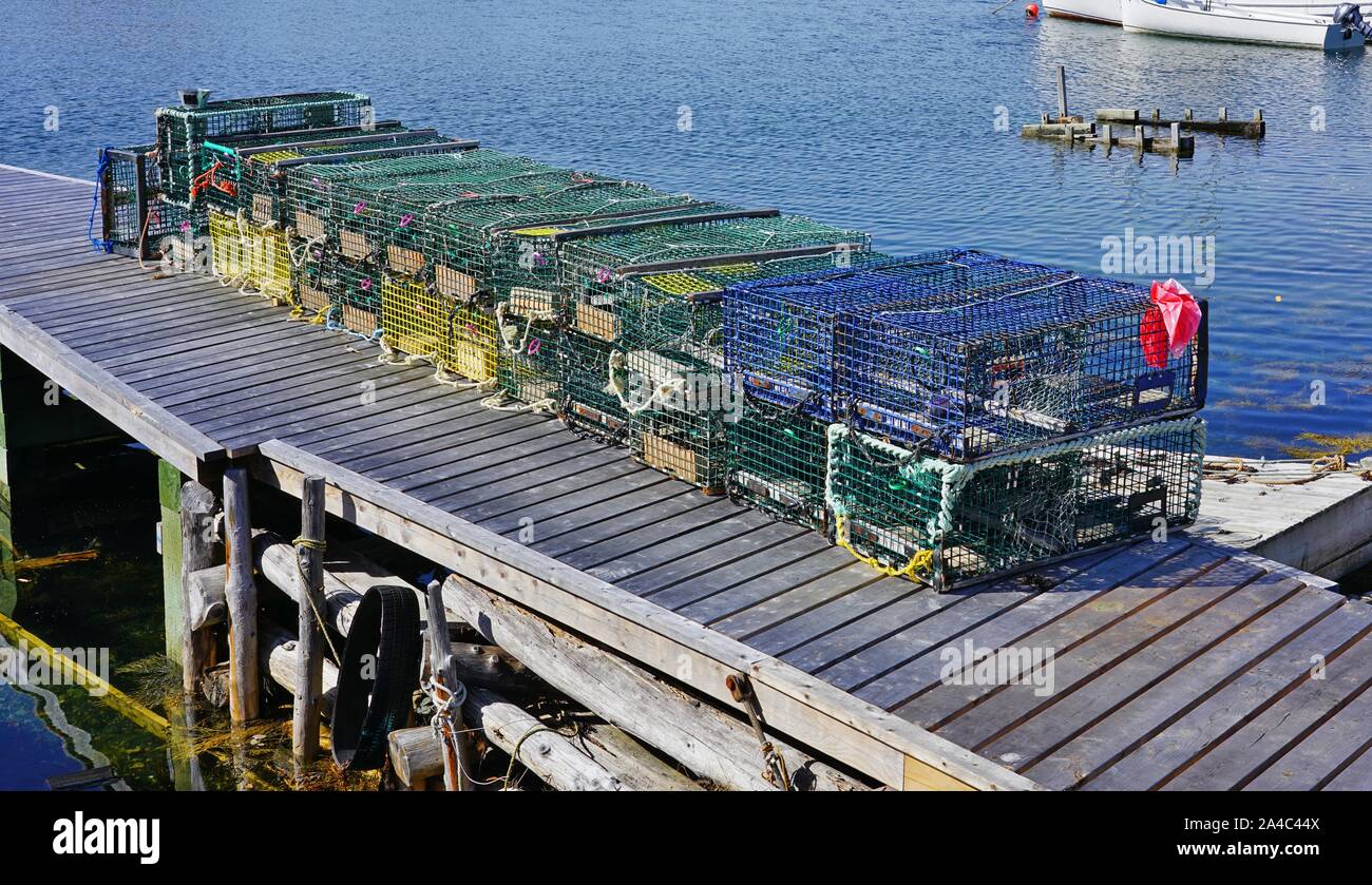 View of stacks of lobster traps in Nova Scotia, Canada Stock Photo - Alamy