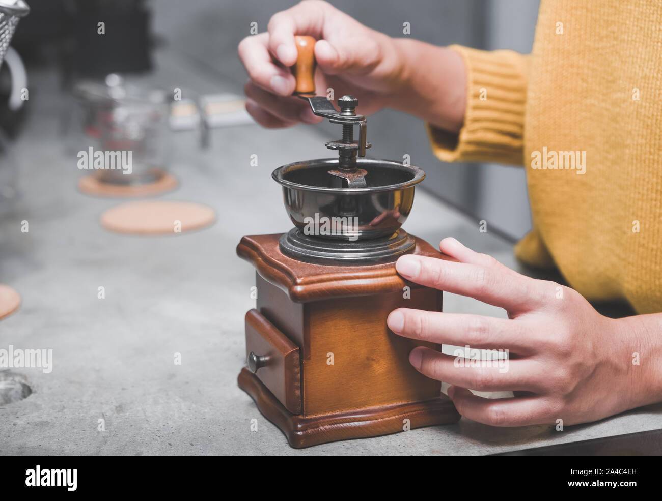 Manual coffee grinding hi-res stock photography and images - Alamy
