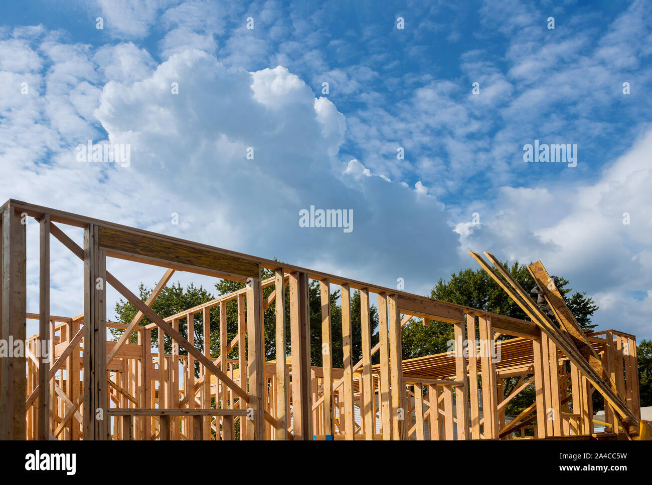 Exterior view construction new residential home framing Stock Photo - Alamy