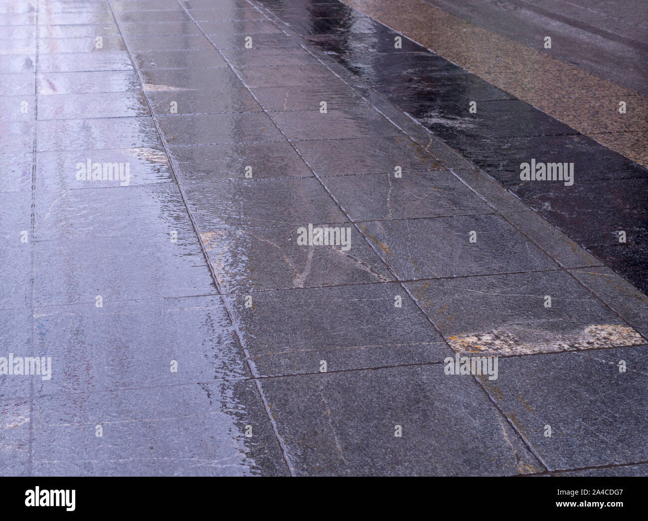 wet tiled sidewalk pavement at rainy day. background, texture Stock ...