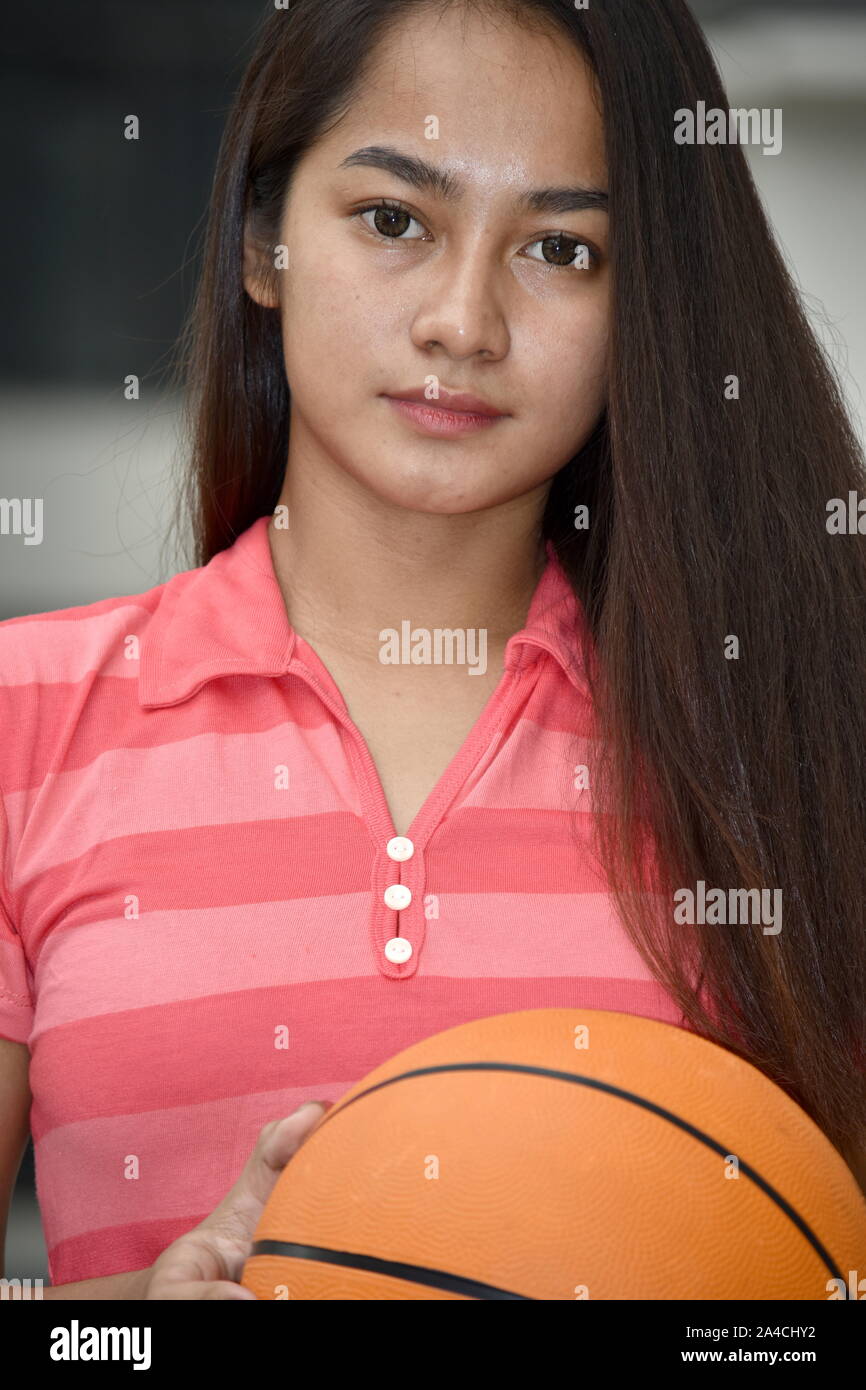 Pretty female basketball player hi-res stock photography and images - Alamy