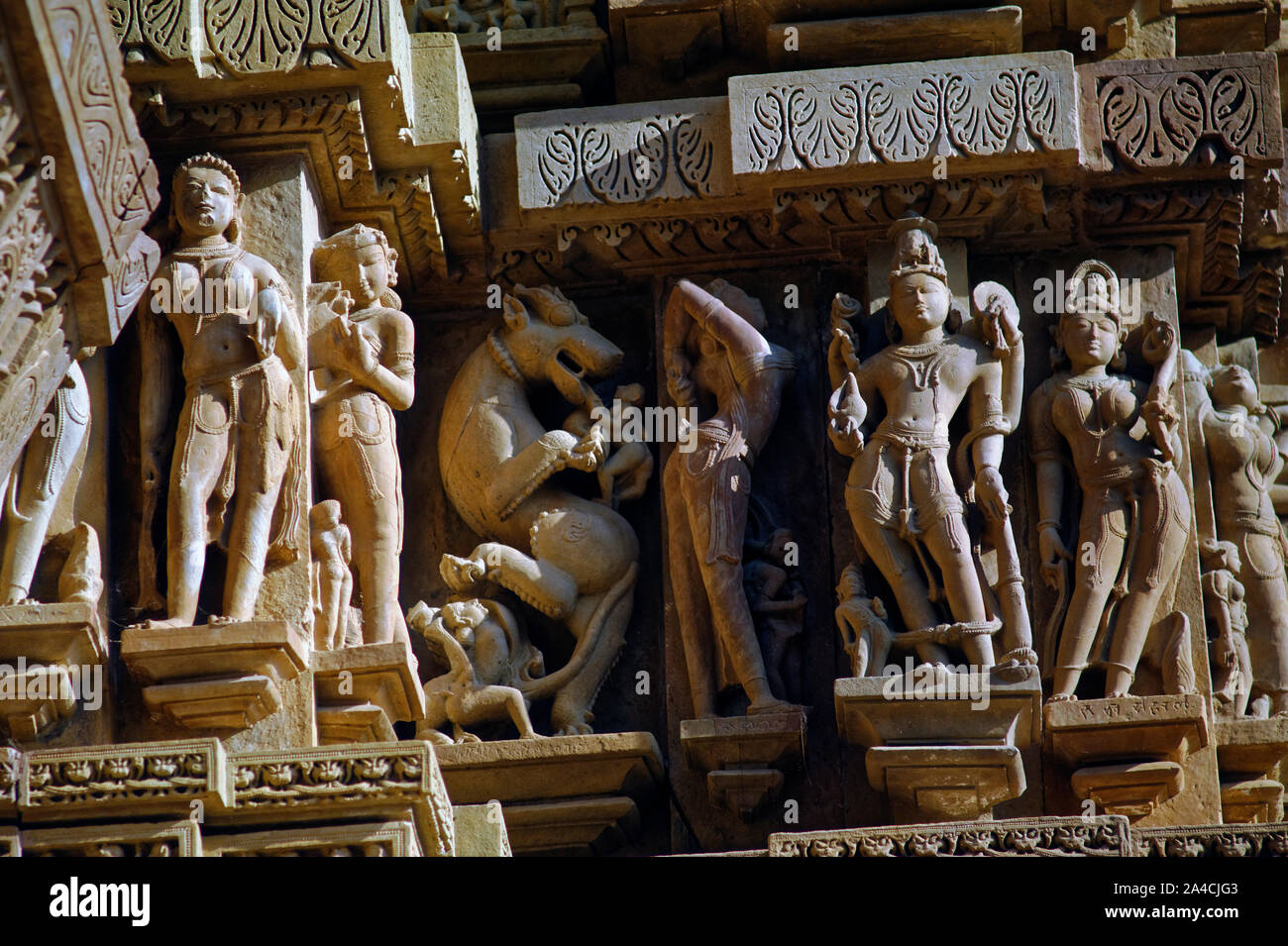 Carving on the wall of temple Stock Photo - Alamy